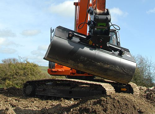 Godet de curage inclinable geith international