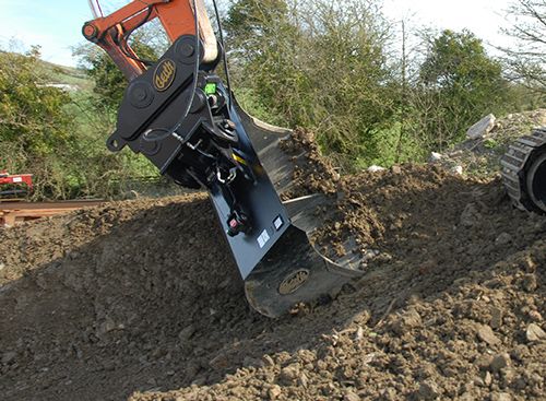 Godet de curage inclinable geith international